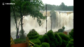 Waterfall gushes past safety barricades as Cyclone Taute hits south ...