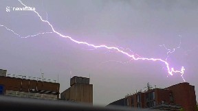 Thunderstorms and downpour as lightning streaks across London sky ...